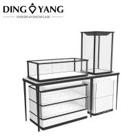China Modern Glass Stainless Steel Fashionable Jewelry Showcase With Led Light for sale