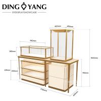 China Modern Glass Stainless Steel Fashionable Jewelry Showcase No Installation With Led Light for sale
