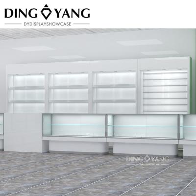 China 2 Layers Modern Jewelry Counter Showcase Silver Stainless Steel Frame With Locking Bottom Cabinet for sale