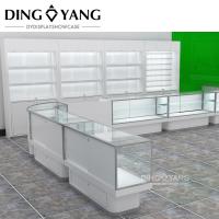 China 2 Layers Modern Jewelry Counter Showcase Silver Stainless Steel Frame With Locking Bottom Cabinet for sale
