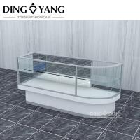 China 2 Layers Modern Jewelry Counter Showcase Silver Stainless Steel Frame With Locking Bottom Cabinet for sale
