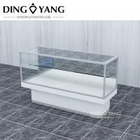 China 2 Layers Modern Jewelry Counter Showcase Silver Stainless Steel Frame With Locking Bottom Cabinet for sale