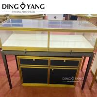 China Golden Black Modern Rectangle Jewelry Showcase With Locking Bottom Cabinet for sale