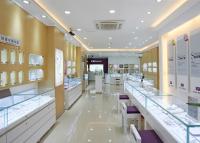 China Retail Shop Lighted Commercial Jewelry Wall Display Case High Glossy White Color for sale