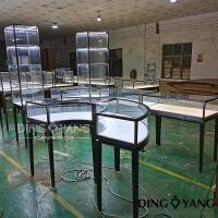 China Custom Rose Gold Curved Jewellery Display Counter Showcase for sale