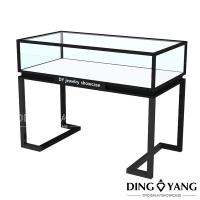 China Custom Made Shinning White Brush Gold Jewelry Table with Glass Display and Locks for sale