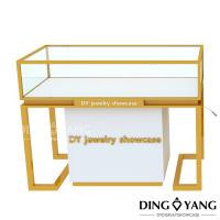 China Custom Made Shinning White Brush Gold Jewelry Table with Glass Display and Locks for sale