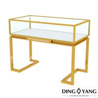China Custom Made Shinning White Brush Gold Jewelry Table with Glass Display and Locks for sale