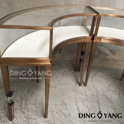 China Rose Gold Curved Stain Steel Showroom Display Cases for sale