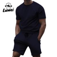 China Cotton Jogging Men Sportswear Set Gym Tracksuit Drawstring 2 Piece Track Suit for sale