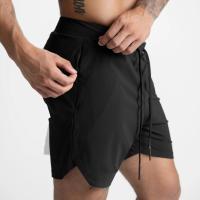 China Drawstring Men Sports Shorts Polyester Woven Plain Jogger Workout Shorts for sale
