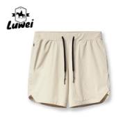 China Drawstring Men Sports Shorts Polyester Woven Plain Jogger Workout Shorts for sale