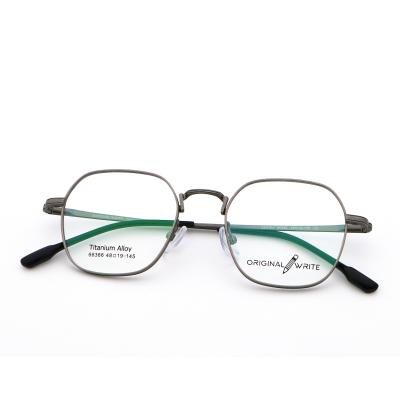 China Designer Elliptic B Titanium Eyeglasses Frames Men Women 66366 for sale
