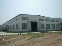 China Prefabricated Industrial Metal Warehouse Multi Span Structural Steel Beams And Columns for sale