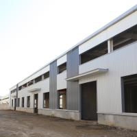 China Prefabricated Steel Frame Steel Structure Building Warehouse Workshop Q235 Q355B for sale