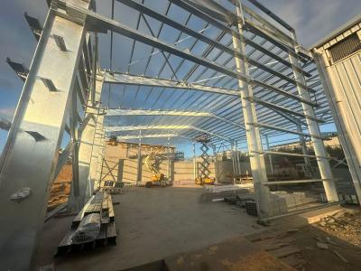 China Hot Dip Galvanized Surface Ultimate Upgrade Affordable Modern Contemporary Metal Construction Building for sale