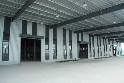 China Economy Steel Structure Industrial Building Rapid Assembly Low Cost Metal Frame Warehouse Construction Solution for sale