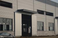 China Q235B Prefabricated Steel Frame Building System Construction for Commercial Warehouse Fast Assembly Minimal Maintenance for sale