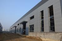China Q235B Prefabricated Steel Frame Building System Construction for Commercial Warehouse Fast Assembly Minimal Maintenance for sale