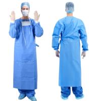 China Reinforcement Blue Surgical Gown Disposable Plastic isolation Gowns Waterproof Plastic Apron With fast shipments for sale