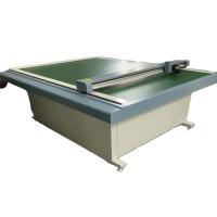 China Kaemi Cutting Machine 1500*1200 Print Dimension Flatbed Cutter Plotter with Blue Frame Silver Case and Multifunctional Features for sale