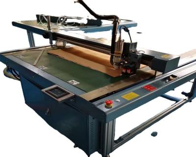 China Automatic Flatbed Cutter Plotter with 1500x900mm Print Dimension and HP45 Ink Box for Precision Cutting for sale