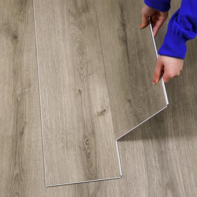 China Unilin Click Lock Spc Flooring Wooden Color Plastic Rigid Core Vinyl Plank Flooring 4mm Indoor for sale