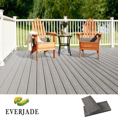 China Groove Design Long Life Wpc Wood Grain Smooth Surface Decking for High Traffic Areas for sale
