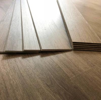 China 8mm-12mm Piano Glossy High Gloss Wood Laminate Flooring T G Installation Waterproof for sale