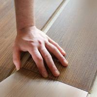 China Embossed Brushed Laminate Flooring TAP GO Decor Wood Floor Click System Square Edges for sale