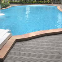China Light Color Wood Plastic Composite Decking for Long-Lasting Swimming Pool Floor Cover for sale