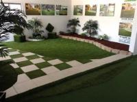 China Interlocking Faux Grass Tiles for Artificial Grass Turf Size 300x300x22/25mm Drainage for sale