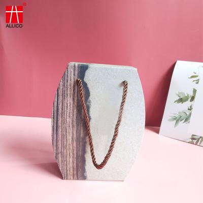 China Custom Logo Printed Rigid Gift Box Packaging Cardboard Boxes With Handle for sale