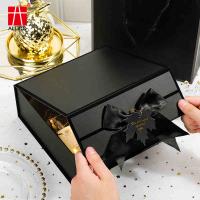 China Custom Closure Folding Black Foldable Packaging Cardboard Magnetic Gift Box for sale