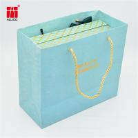 China Custom Design Ribbon Handle Blue Jewelry Cosmetic Gift Clothing Shopping Packaging Bag for sale