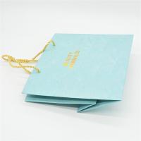 China CMYK Printing Cosmetic Shopping Bag , 140g Makeup Paper Bag for sale