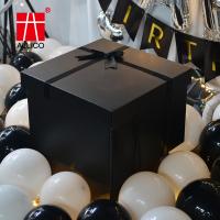 China Light Decorated Rectangular Boxes Garment Packaging Box With Tied Ribbon Bow for sale