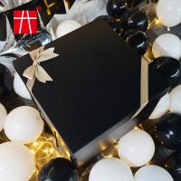 China Light Decorated Rectangular Boxes Garment Packaging Box With Tied Ribbon Bow for sale