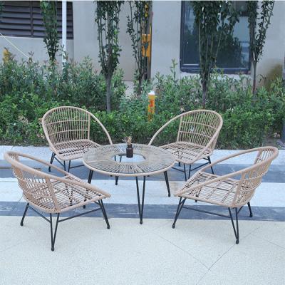 China Pe Rattan Furniture Dining Tables And Chairs Craftsmanship Woven Coffee Table Chair Sofa for sale