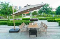 China 11 Pieces Outdoor Patio Furniture Plastic Wood Expandable Aluminum Garden Table And 8 Chairs for sale
