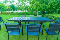 China 9 Pieces Black Plastic Wood Modern Outdoor Garden Furniture Table Set 8-10 Seater Extendable Patio Dining Table Chairs for sale