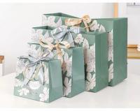 China OEM Foldable 350g Printed Paper Shopping Bag With PP Rope For Gift Shopping Packaging for sale