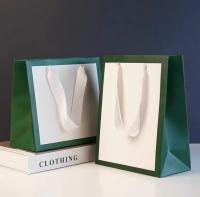 China Pink Printed Paper Shopping Bag With Ribbon Customize Logo For Gift Packaging for sale