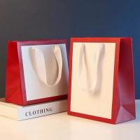 China Pink Printed Paper Shopping Bag With Ribbon Customize Logo For Gift Packaging for sale