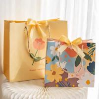 China Colorful Art Paper Printed Paper Shopping Bag For Clothing Gift Packaging for sale