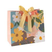 China Colorful Art Paper Printed Paper Shopping Bag For Clothing Gift Packaging for sale