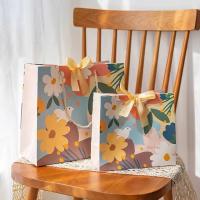 China Colorful Art Paper Printed Paper Shopping Bag For Clothing Gift Packaging for sale