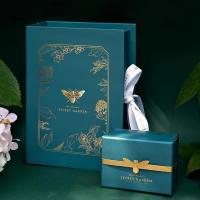 China Green Art Paper Book Cardboard Boxes With Ribbon Magnetic Perfume Gift Packaging for sale