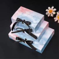 China Colorful Coated Paper Foldable Gift Boxes With Ribbon Printing Logo Apparel Packaging for sale