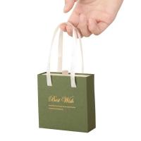 China Green Color Art Paper Paperboard Gift Boxes With Ribbon Handle EVA Inserter Jewelry Packaging for sale
